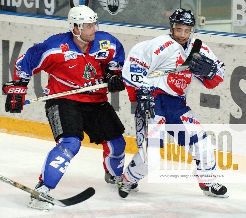 Sergej Stas (li., Freiburg) gegen Greg Leeb (Nürnberg) Eishockey DEL ...