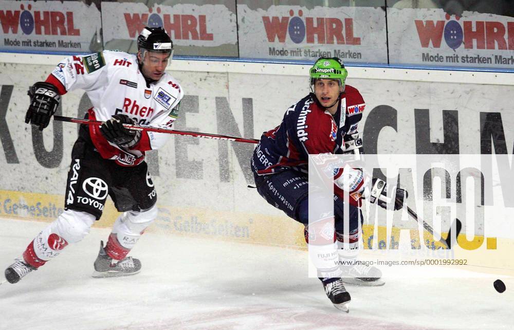 Benjamin Barz (Nürnberg, re.) gegen Andreas Renz (Köln) Eishockey DEL ...