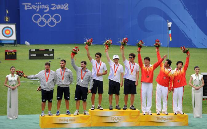 Siegerehrung Teamwertung bei Olympia 2008, v.li.: Ilario Di Buo, Mauro ...