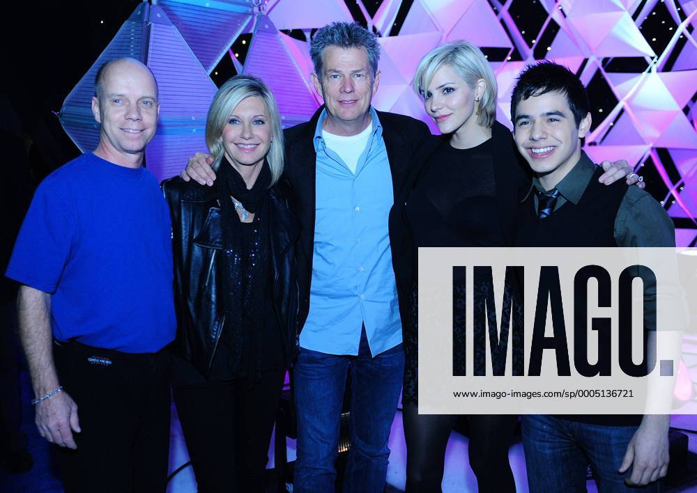 From left to right, skating icon Scott Hamilton, singer Olivia Newton ...