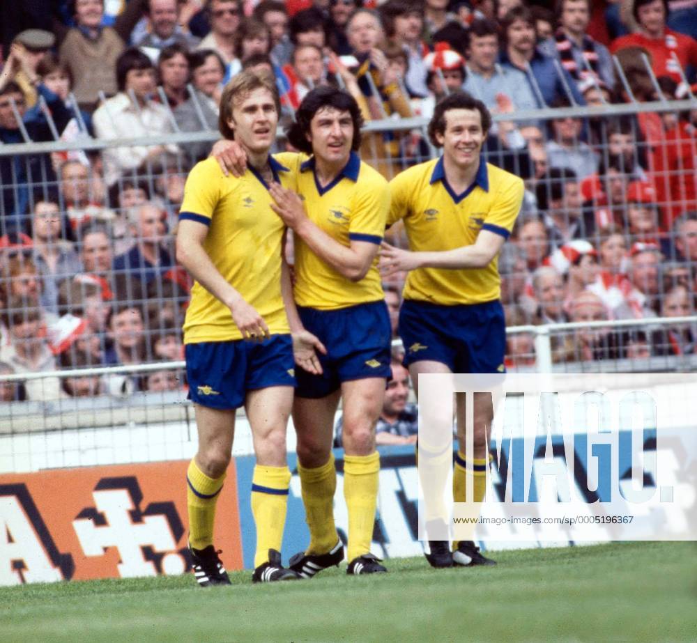 Brian Talbot celebrates his goal with David Price and Liam Brady ...
