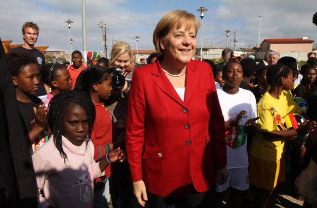 German chancellor Angela Merkel on a visit to Khayelitsha, South Africa ...