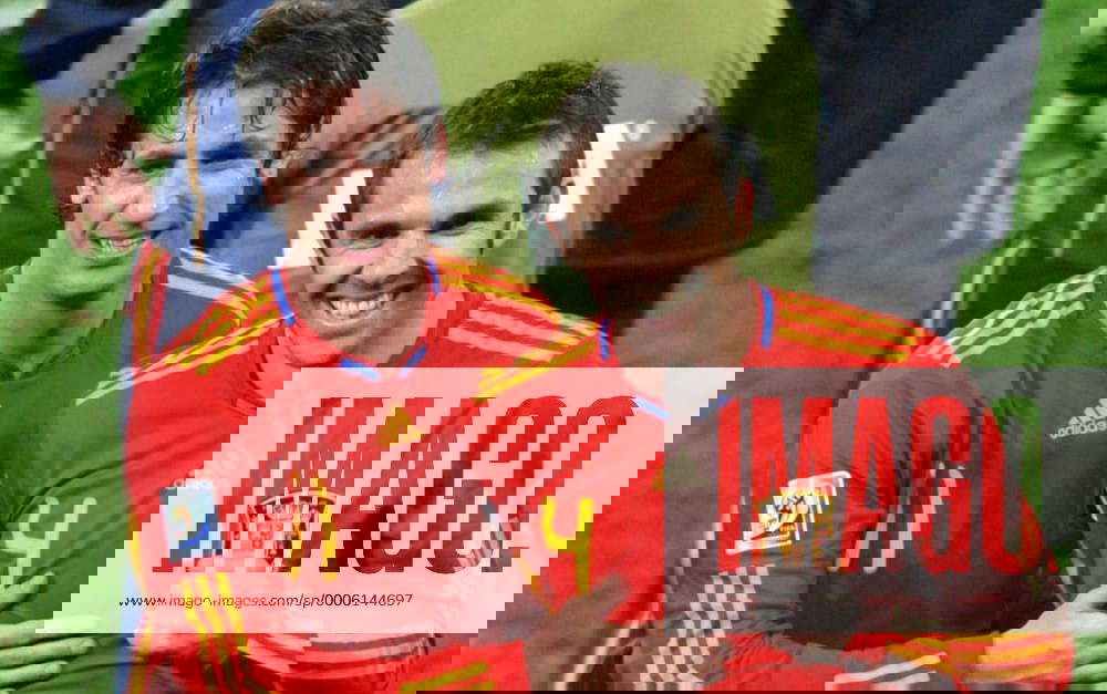 Spain s Joan Capdevila (L) and Carlos Marchena celebrate after the 2010 ...