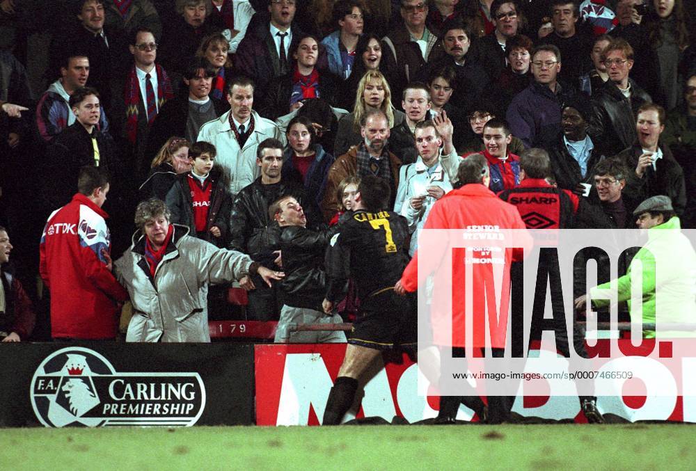 25 January 1995: ERIC CANTONA (Manchester United, C) attacks Crystal Palace fan Matthew Simmons