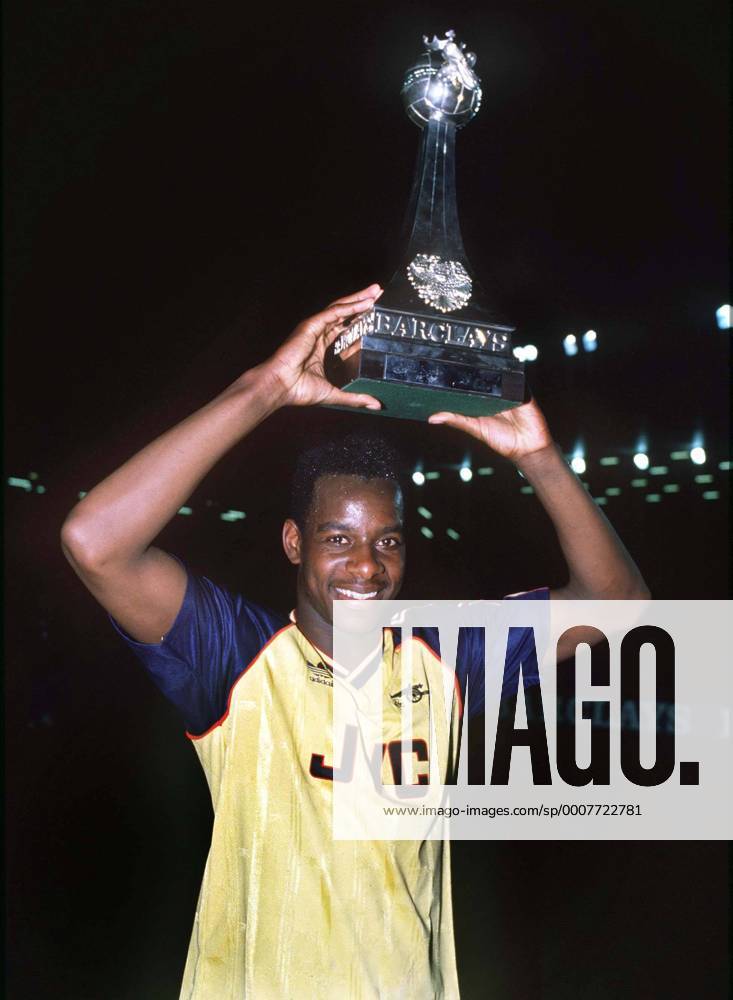 Michael Thomas celebrates with the trophy. Liverpool v Arsenal; Anfield ...