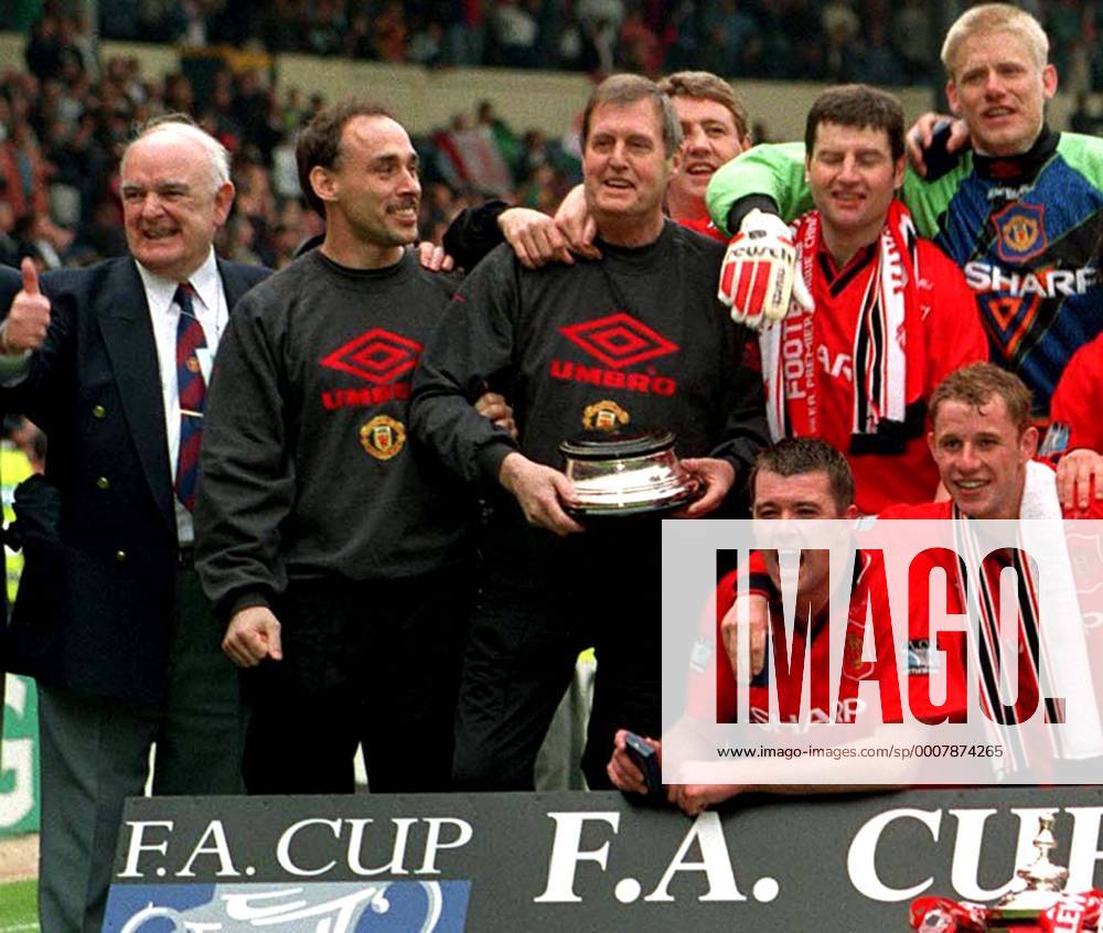 Manchester United staff celebrate with the team. L to R. Dr Francis ...