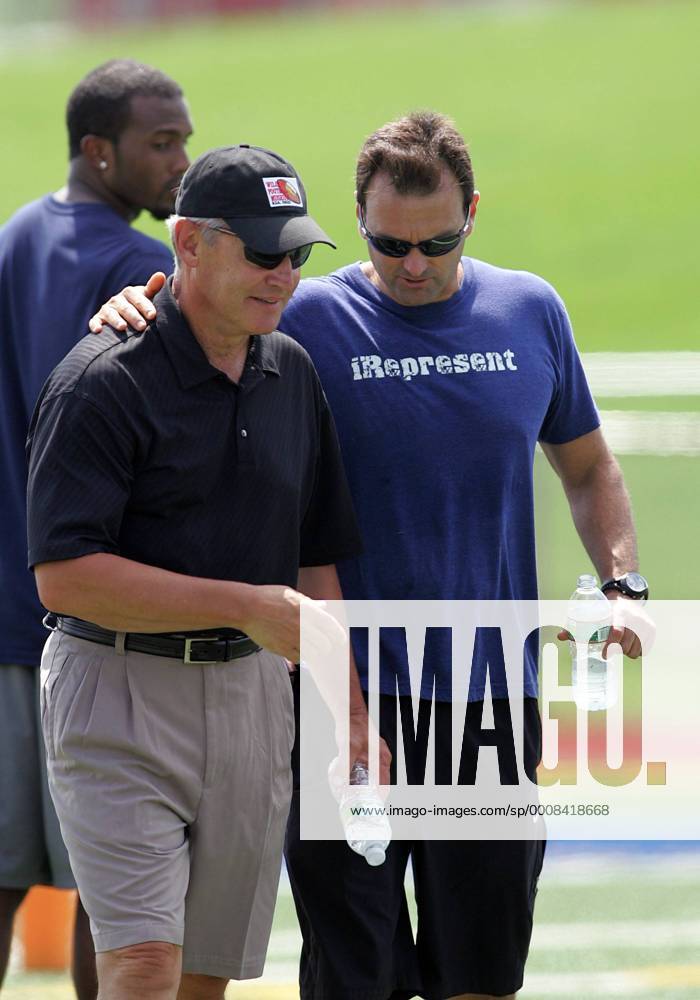 Jim Tressel and Drew Rosenhaus speak during Terrelle Pryor s NFL ...