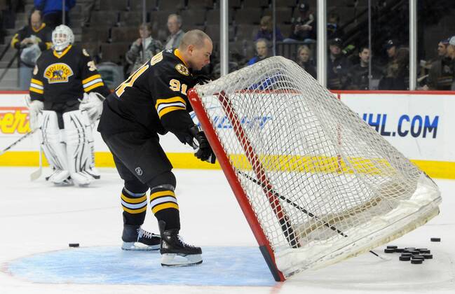 13 January 2011:Boston Bruins center Marc Savard 91 comes out of the ...
