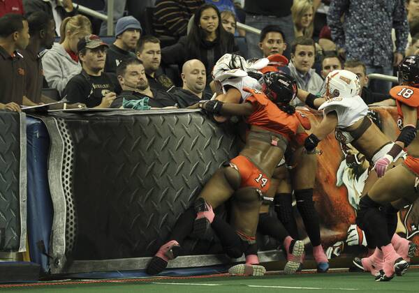 : Breeze defenders Courtney Wilder and Julie Rolfe tackle Marija ...