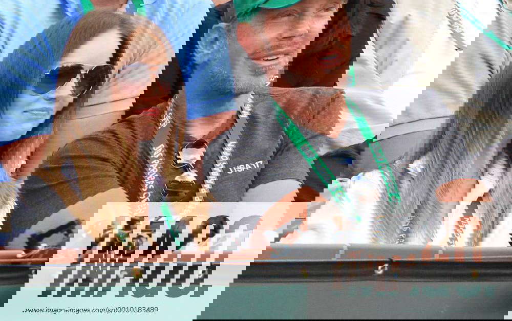 Oracle CEO and tournament owner Larry Ellison and girlfriend Nikita ...