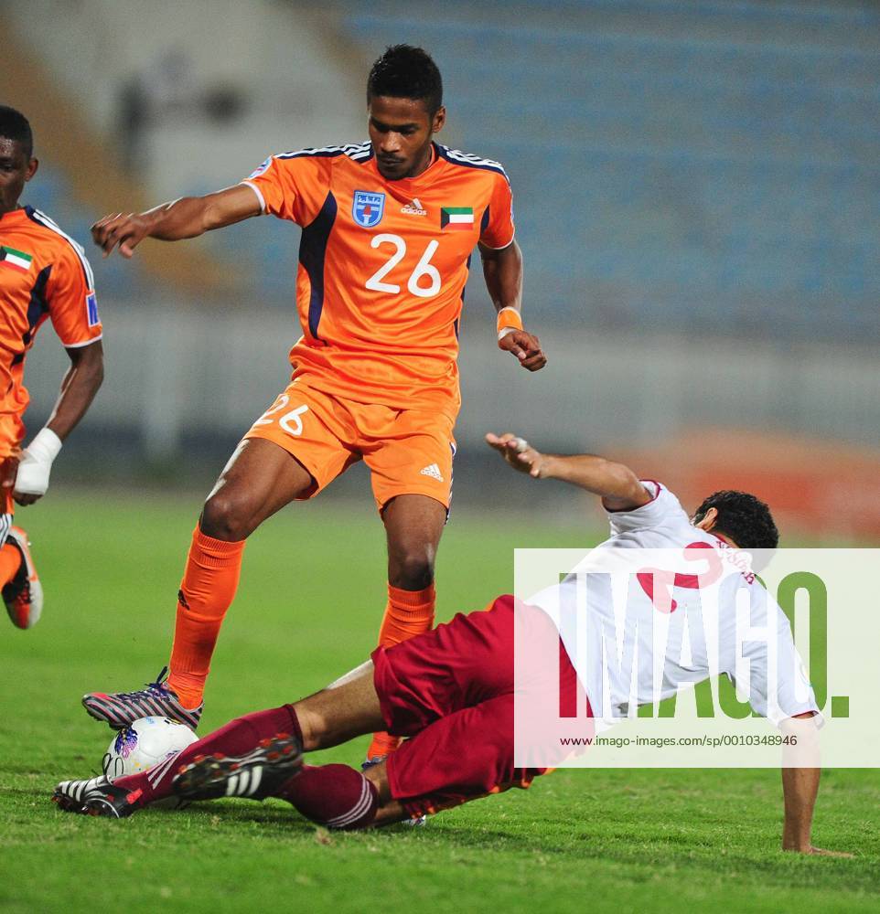 KUWAIT CITY, Naser al Farag of Kuwait s Kazma SC vies with Abdul Karim ...