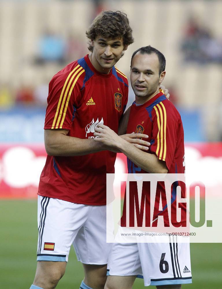 Spain s Fernando LLorente (l) and Andres Iniesta during friendly match.June
