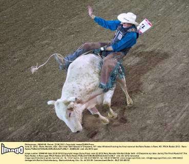 Reno, Nevada, USA - Bull rider Seth Glause of Cheyenne, WY rides Big ...