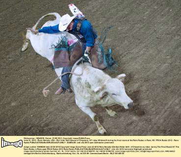 Reno, Nevada, USA - Bull rider Seth Glause of Cheyenne, WY rides Big ...