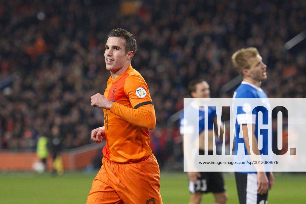 (L-R) Robin van Persie of Holland, Martin Vunk of Estonia, Ragnar ...