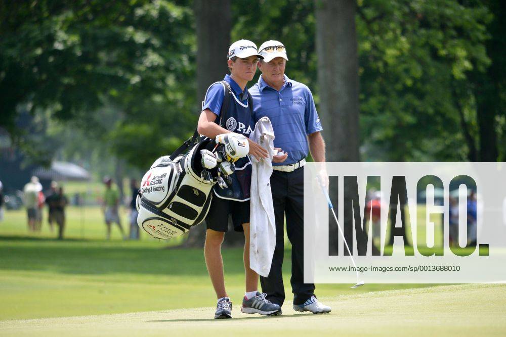 May 26, 2013 - St. Louis, Missouri, U.S. - FRED FUNK and his caddy son ...