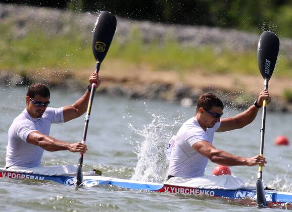 ITAR-TASS: KAZAN, RUSSIA. Russia s Vitaly Yurchenko and Vasily Pogreban ...