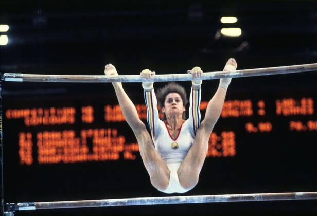 Moscow Olympic Games Nadia Comaneci from Romania undoes her bandages ...