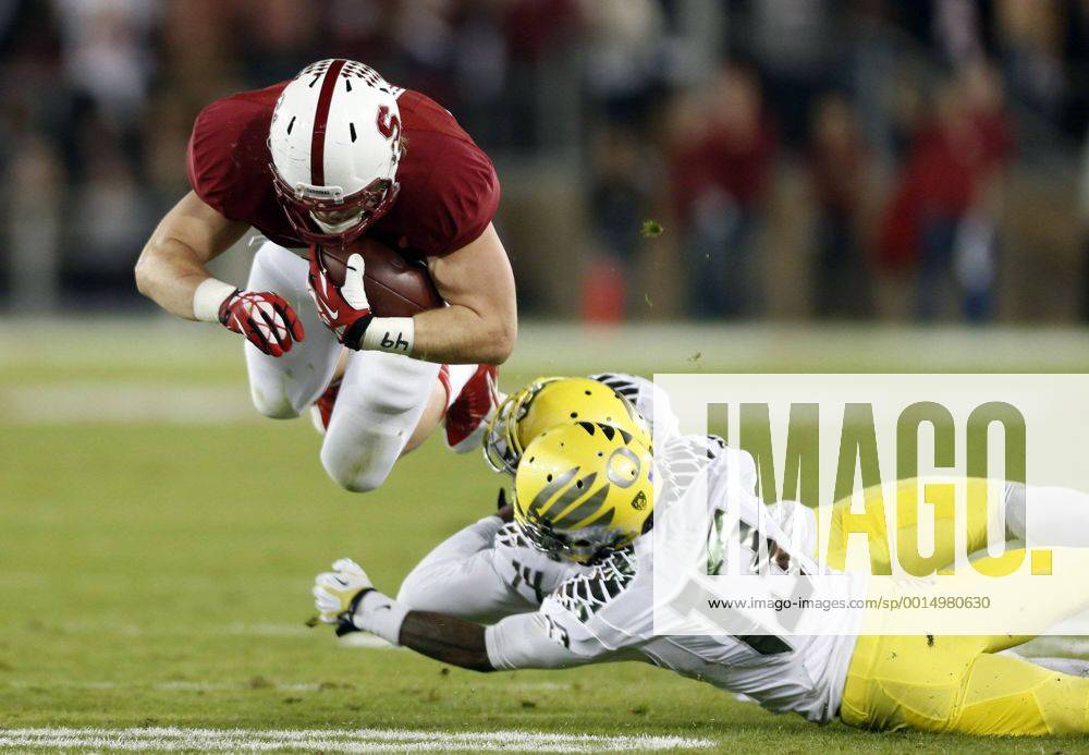 Nov. 7, 2013 - Stanford, CA, USA - Ryan Hewitt of Stanford flies over ...