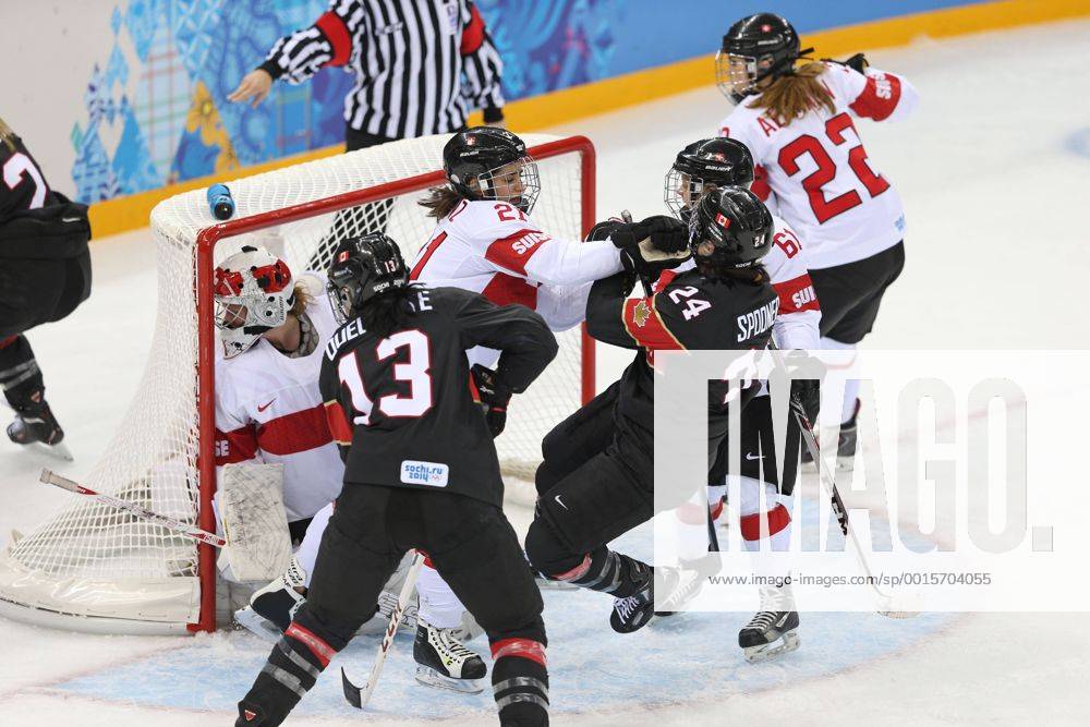 Laura Benz, SUI, pushes Natalie Spooner, CAN, in her face during ...