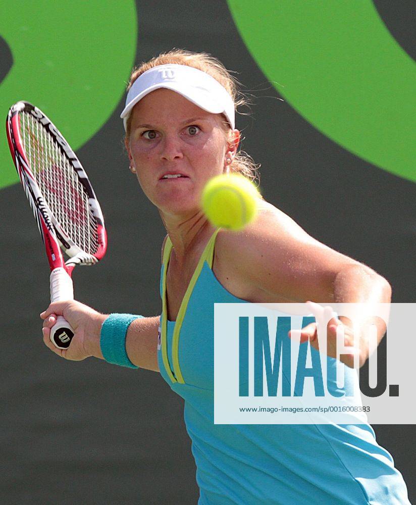 Miami, FL, USA - The USA s Melanie Oudin returns a ball during the ...