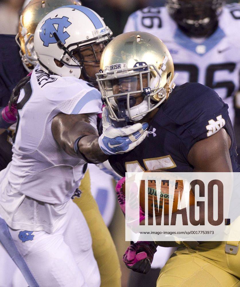 Oct. 11, 2014 - South Bend, IN, USA - UNC safety Sam Smiley grabs the ...