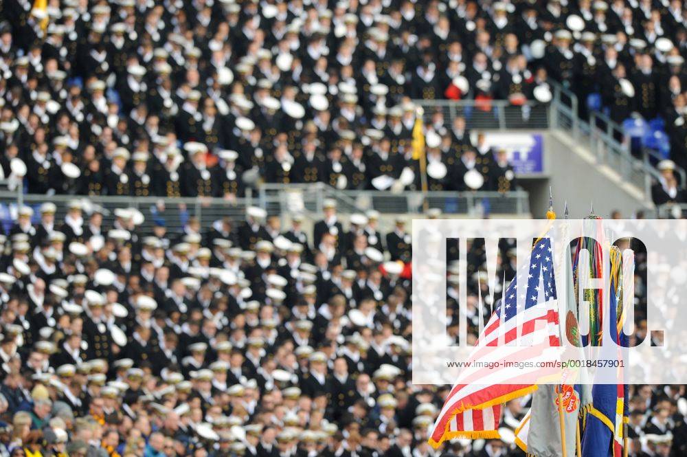 DEC 13, 2014 : Flags are hoisted on the field for the National Anthem ...