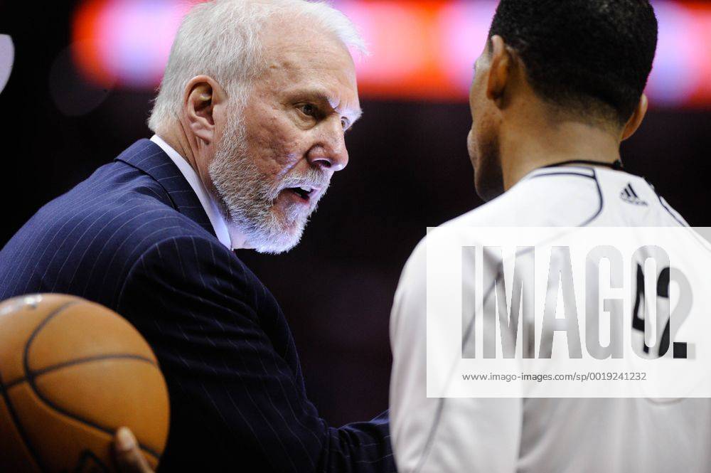 San Antonio Spurs coach Gregg Popovich questions a call with ref Eric ...