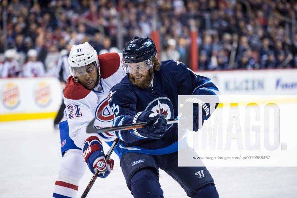 26 Mar 2015 Canadiens Devante Smith-Pelly (21) battles Jets Matt ...