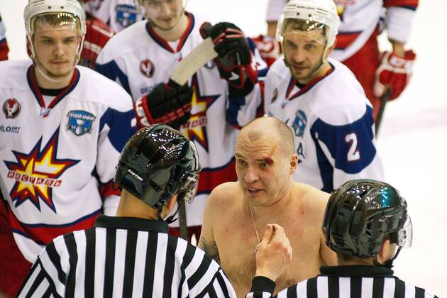 TVER, RUSSIA. Andrei Razin, HC Izhstal head coach, talks with a referee ...