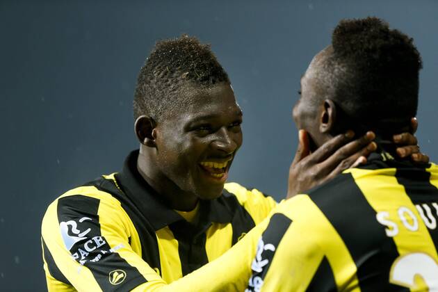 - LIER, BELGIUM: Lierse s Hamari Traore and Lierse s Eric Matoukou ...