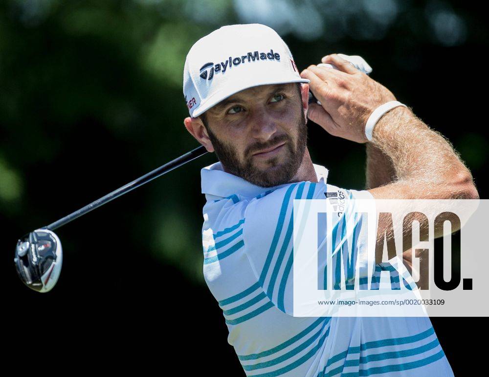 : Dustin Johnson tees off on hole 4 during the fourth round of the AT&T ...