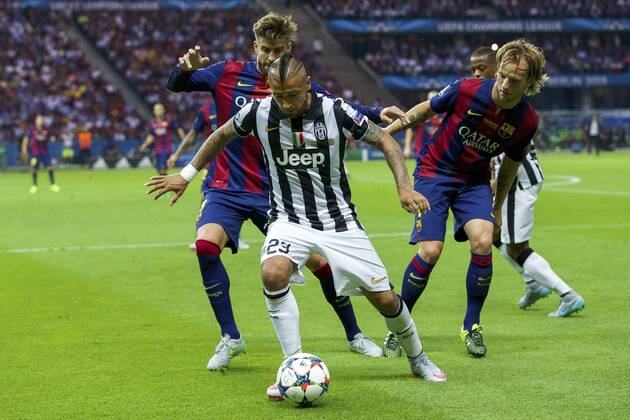 (L-R) Gerard Pique of FC Barcelona Barca Arturo Vidal of Juventus FC ...