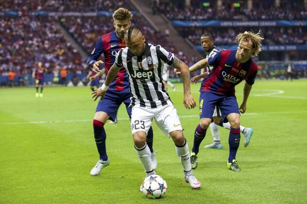 (L-R) Gerard Pique of FC Barcelona Barca Arturo Vidal of Juventus FC ...