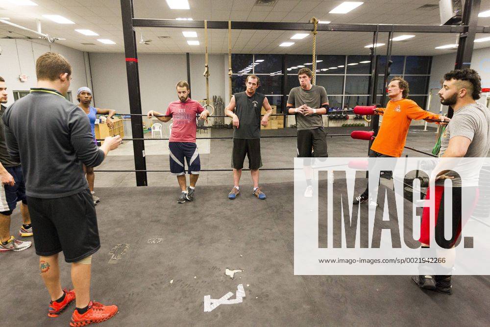 Sept. 16, 2014 - Moline, Iowa, U.S. - Nick Morrill, left, head ...