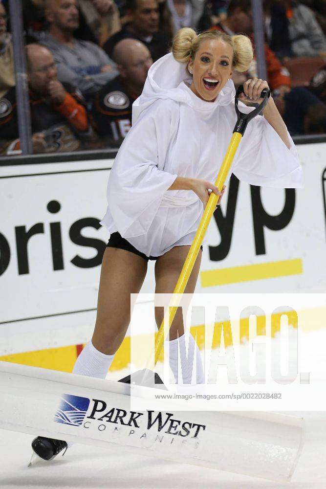 December 2, 2015: Krista from the ice girls cleans in stoppage time ...