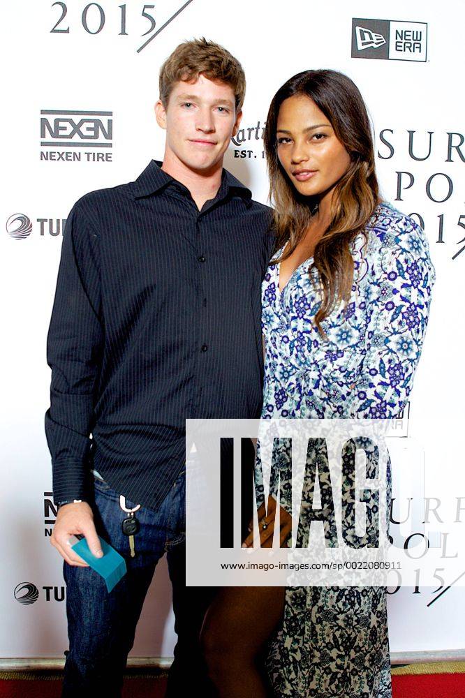 December 6, 2015 - Pro surfer Nathan Florence and girl friend model ...