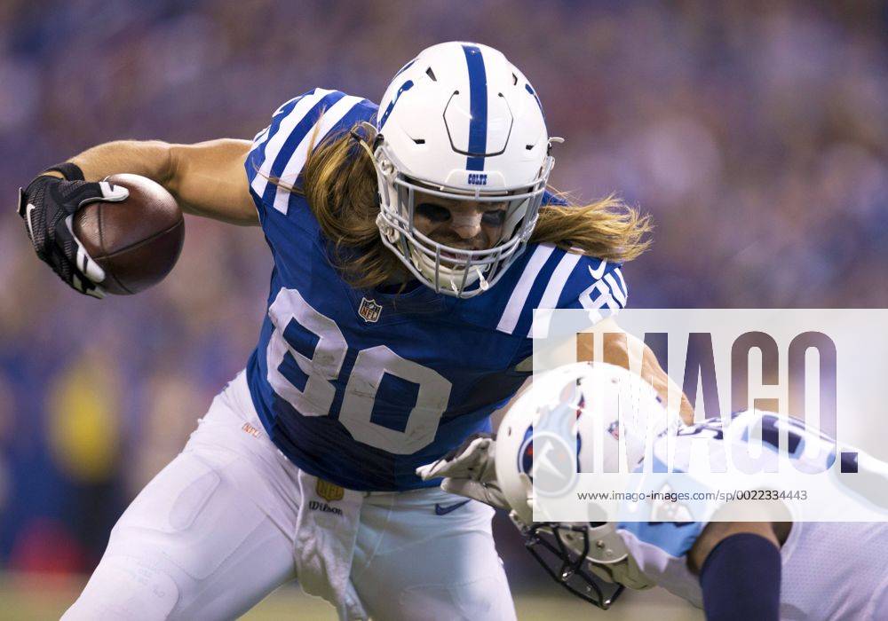 : Indianapolis Colts tight end Coby Fleener runs with the ball after ...