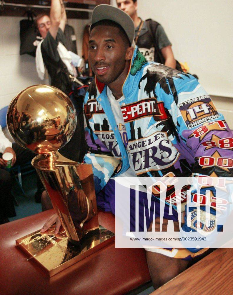Kobe Bryant Los Angeles Kobe Bryant holds the NBA championship trophy ...
