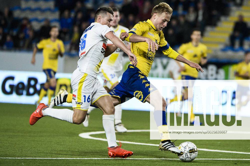 Westerlo s Jordan Mustoe and STVV s Roman Bezus pictured during the ...