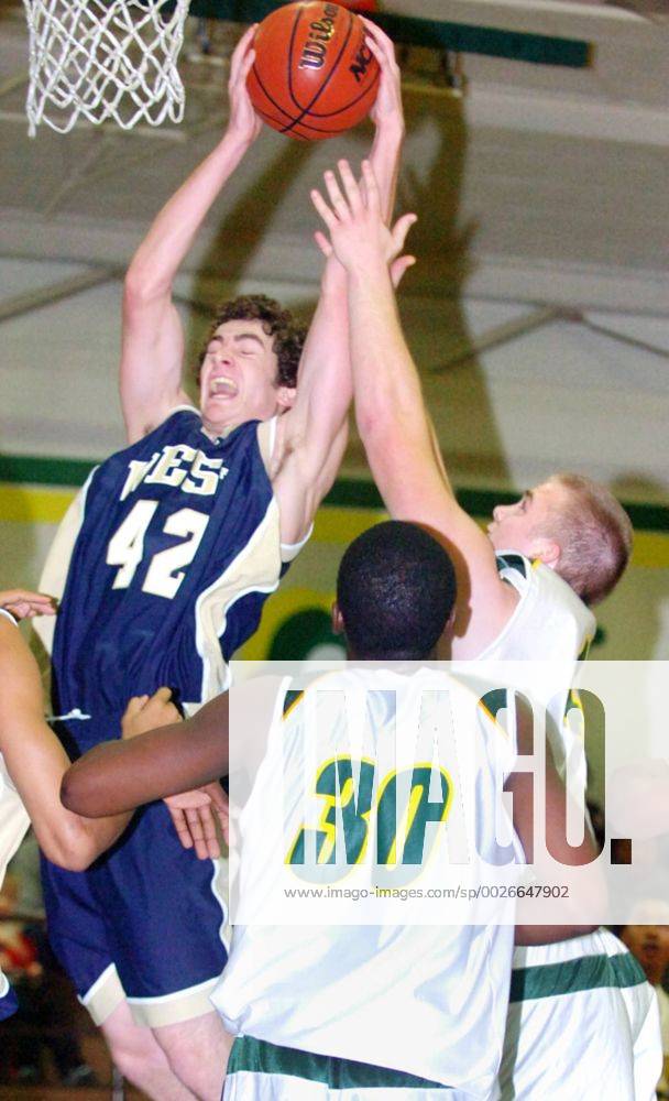 West High basketball player Kyle Vandrimmelen puts one up against the ...