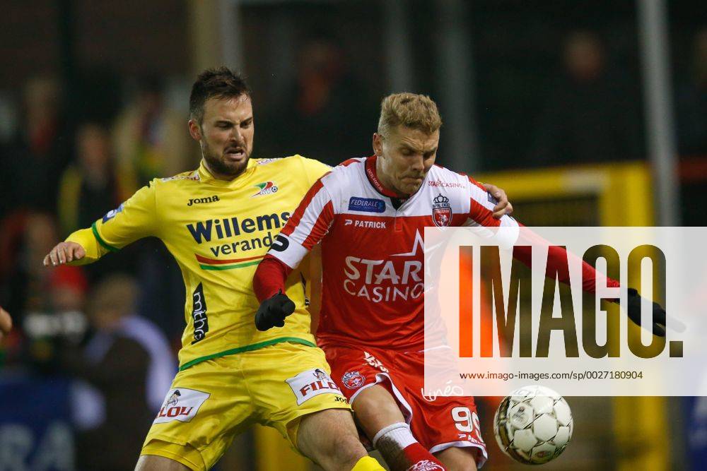 Oostende s Antonio Milic and Mouscron s Delvydas Matulevicius fight for ...