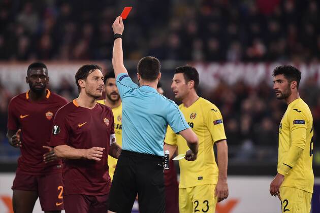 Francesco Totti argues with referee Felix Zwyer as he sends off Antonio ...
