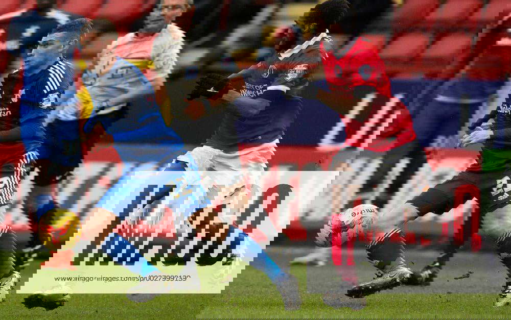 Stuart O Keefe of Cardiff City get away from Zakarya Bergdich of ...