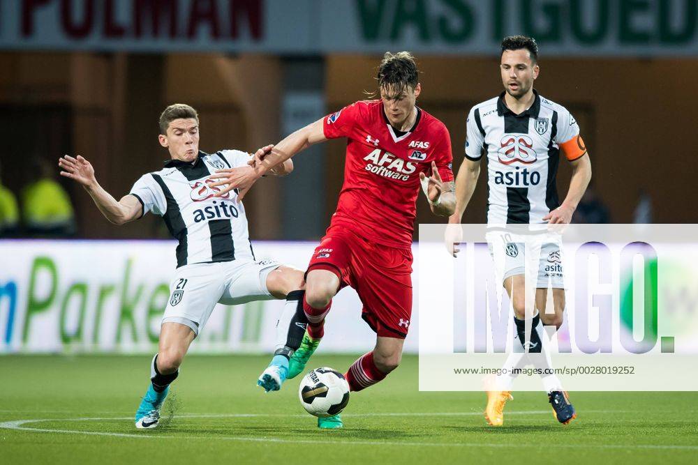 (L-R) Robin Gosens of Heracles Almelo, Wout Weghorst of AZ, Thomas ...