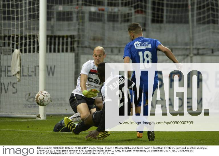 Eupen s Moussa Diallo and Rupel Boom s Jonathan Kerstenne pictured in ...