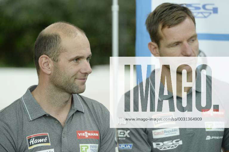Coaches of Czech biathletes L-R MICHAEL MALEK and ZDENEK VITEK attend ...