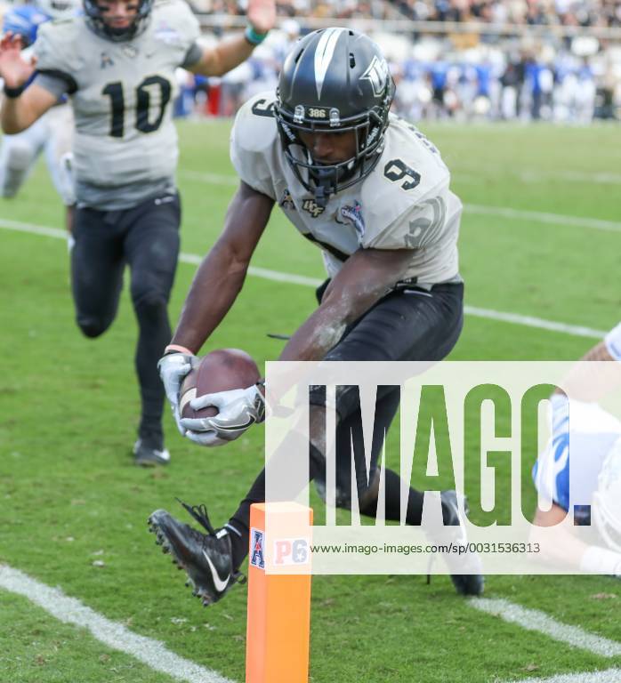 : UCF s Adrian Killins Jr. 9 crosses the goal line to score a touchdown ...