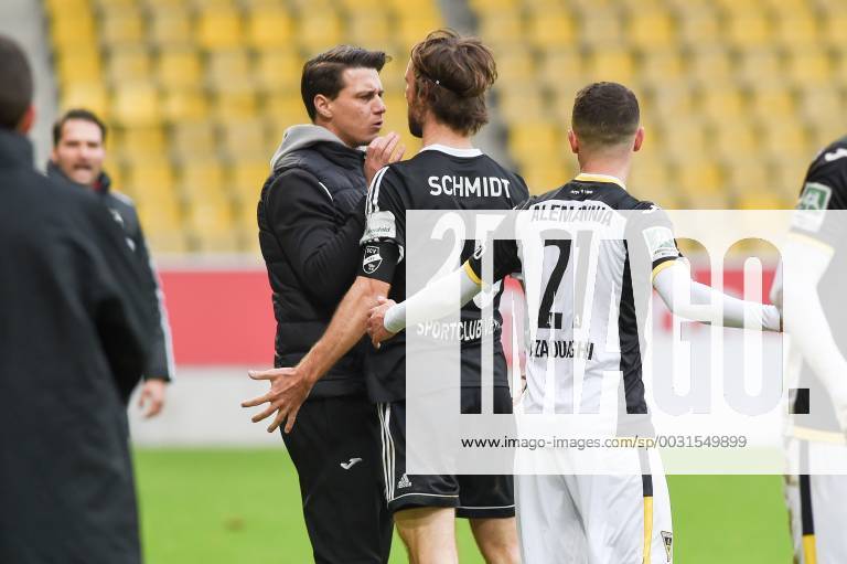 v left Simon Pesch coach Alemannia Aachen tries to convince Julian ...