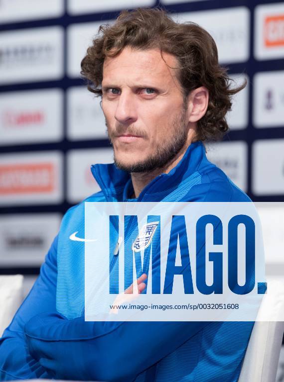 Uruguayan football player Diego Forlan attends the signing ceremony to ...